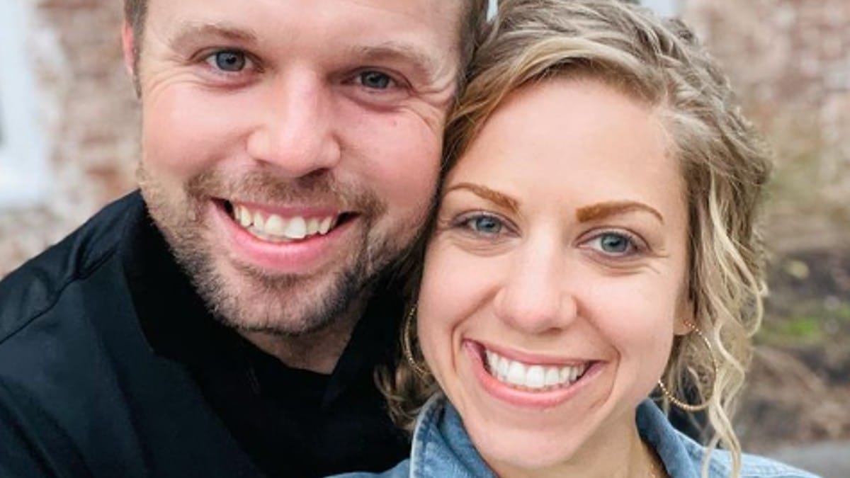 John David Duggar and Abbie Grace Burnett vacation with 'client'